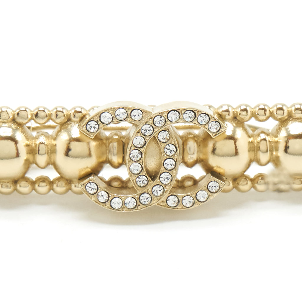 Chanel 22c hair clip light gold tone